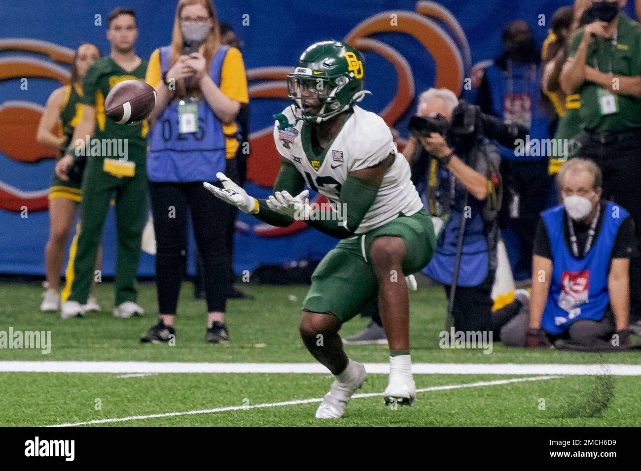 Baylor cornerback Al Walcott (13) intercepts a pass, returning it for a ...