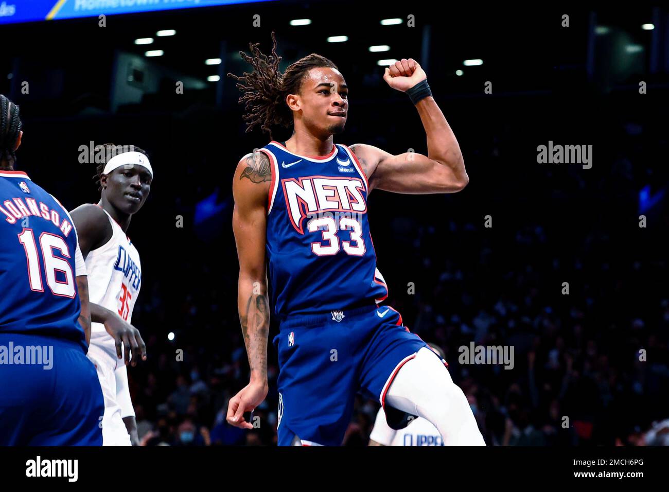 Brooklyn Nets forward Nic Claxton reacts to his dunk against the Los ...