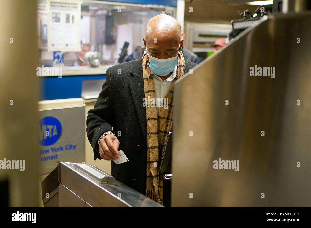 New York City Mayor Eric Adams rides the subway to City Hall on his ...