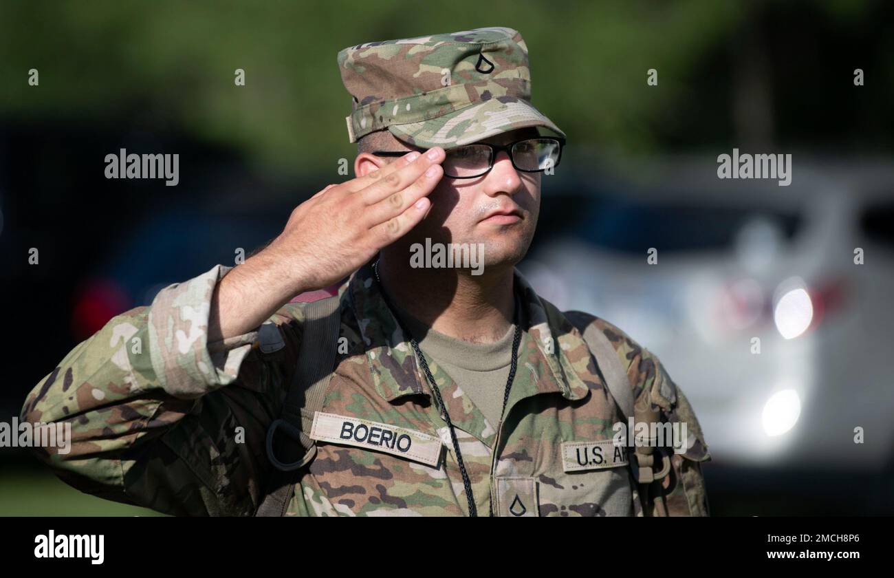 Pfc. Jacob Boerio, a trainee at Fort Jackson, S.C., salutes during the ...