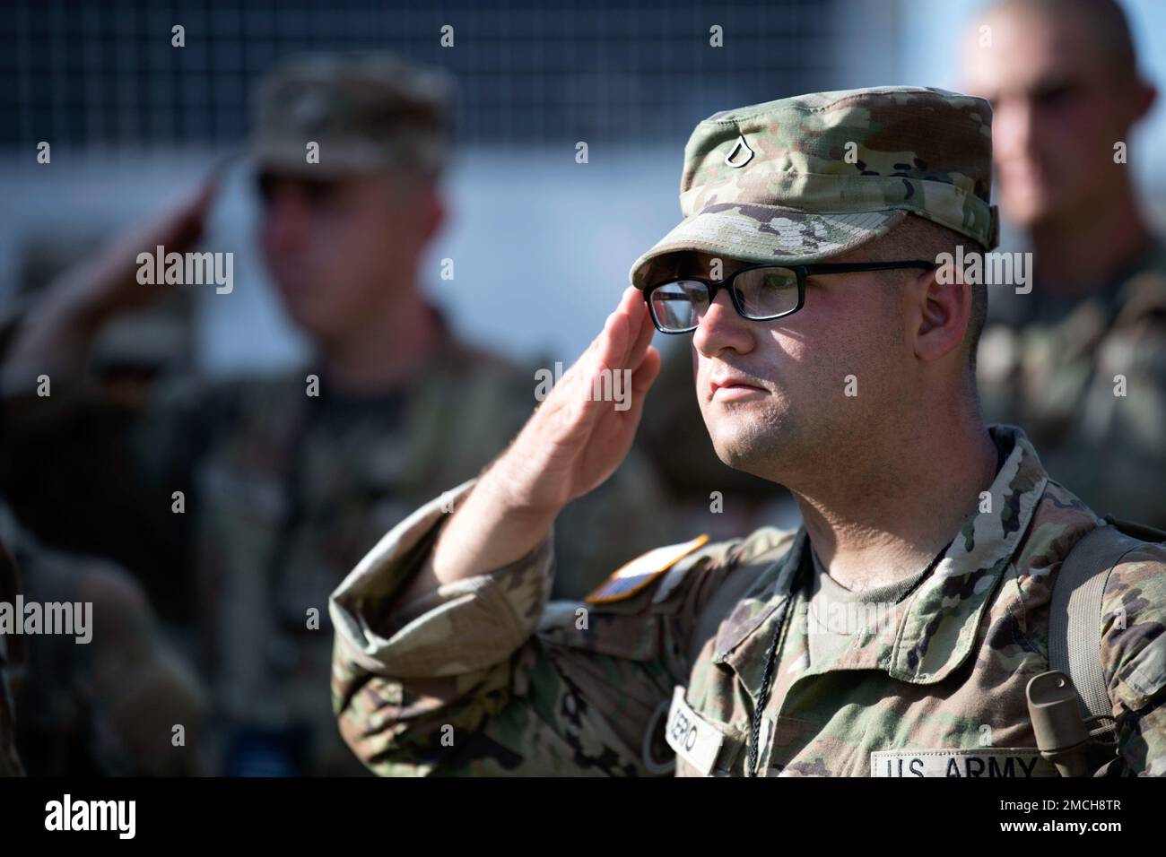 Pfc. Jacob Boerio, a trainee at Fort Jackson, S.C., salutes during the ...