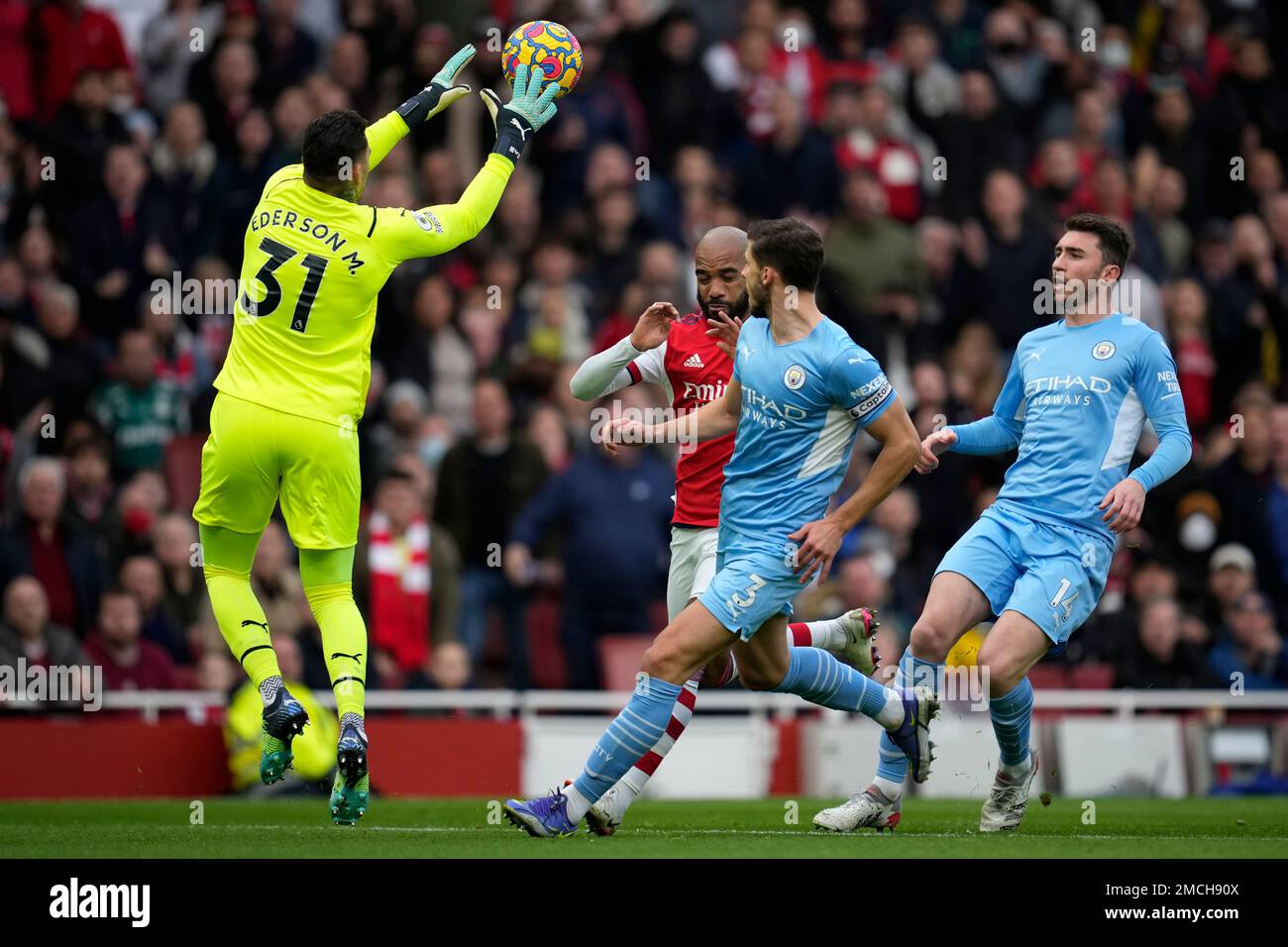 Manchester City's goalkeeper Ederson catches a ball during the Premier ...