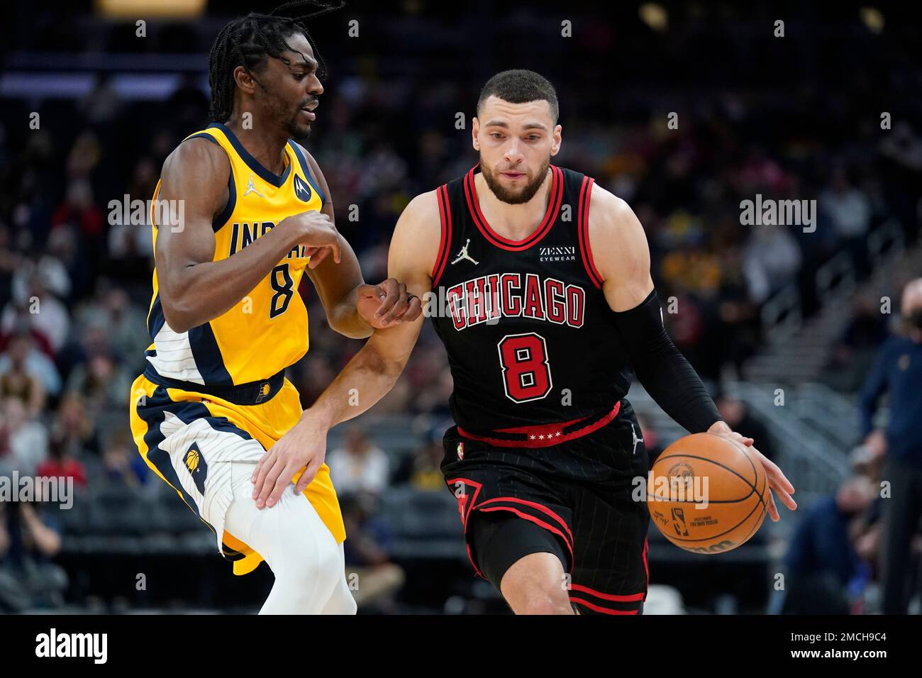 Chicago Bulls' Zach LaVine (8) is defended by Indiana Pacers' Justin ...