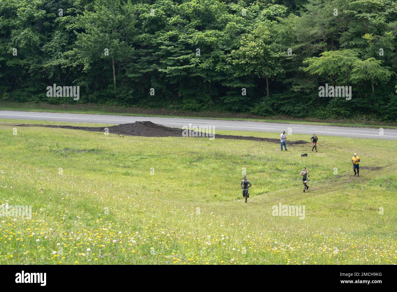 Members from Team Misawa run during the annual Misawa Mudder at Misawa ...