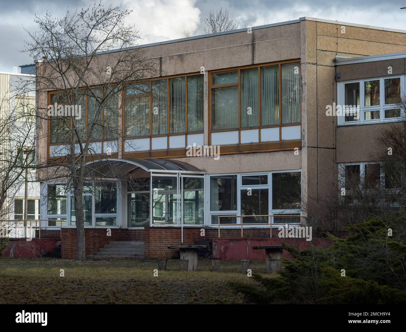 Abandoned old school building in soviet style architecture. Weathered ...