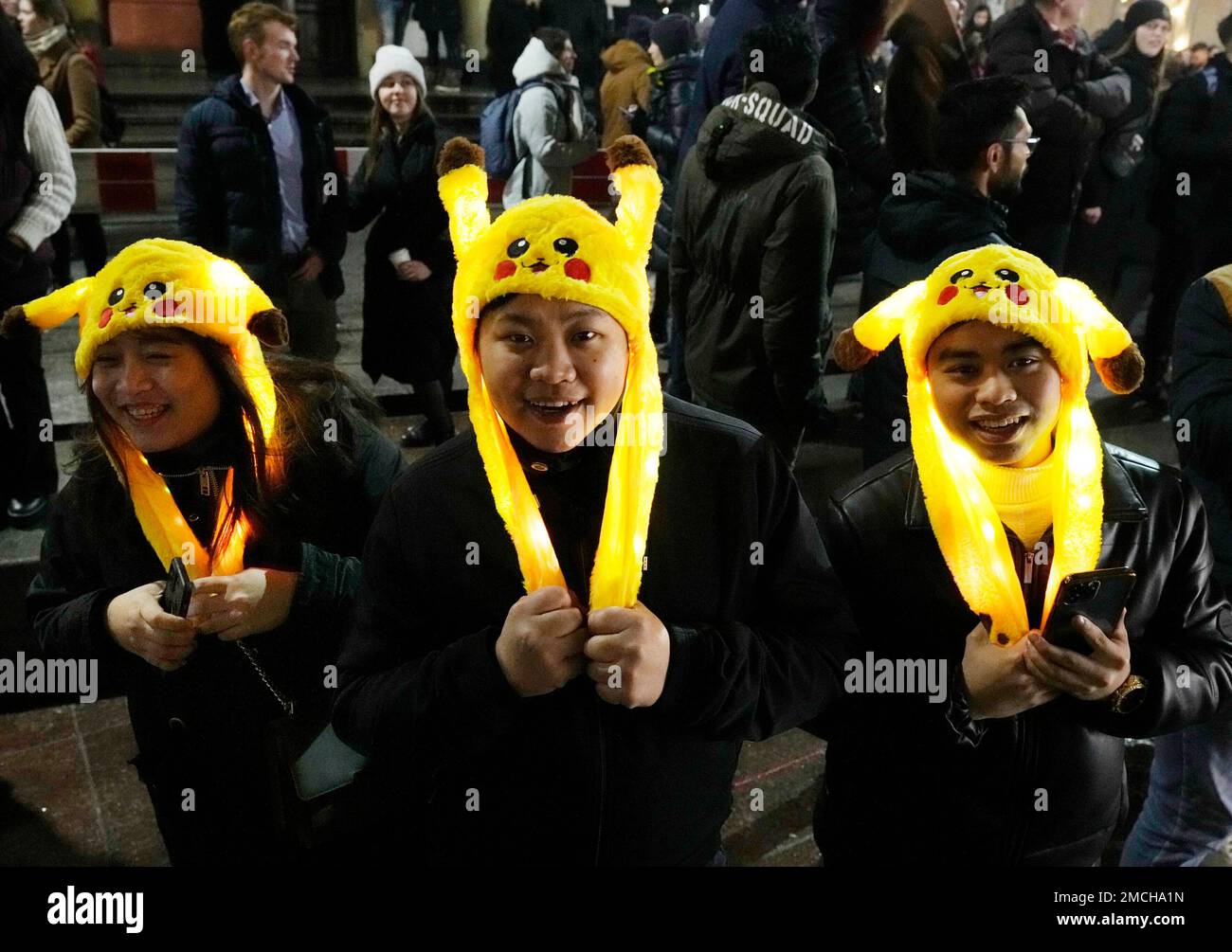 People, wearing Pikachu hats, celebrate the New Year in Warsaw, Poland ...