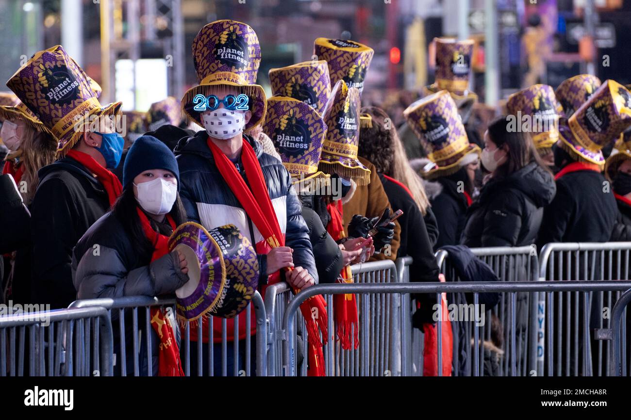 Revelers gather in Times Square in New York Friday, Dec. 31, 2021 as ...
