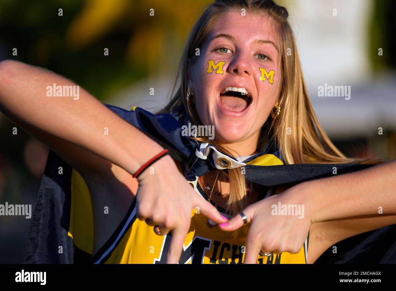A Michigan fans poses before the Orange Bowl NCAA College Football ...