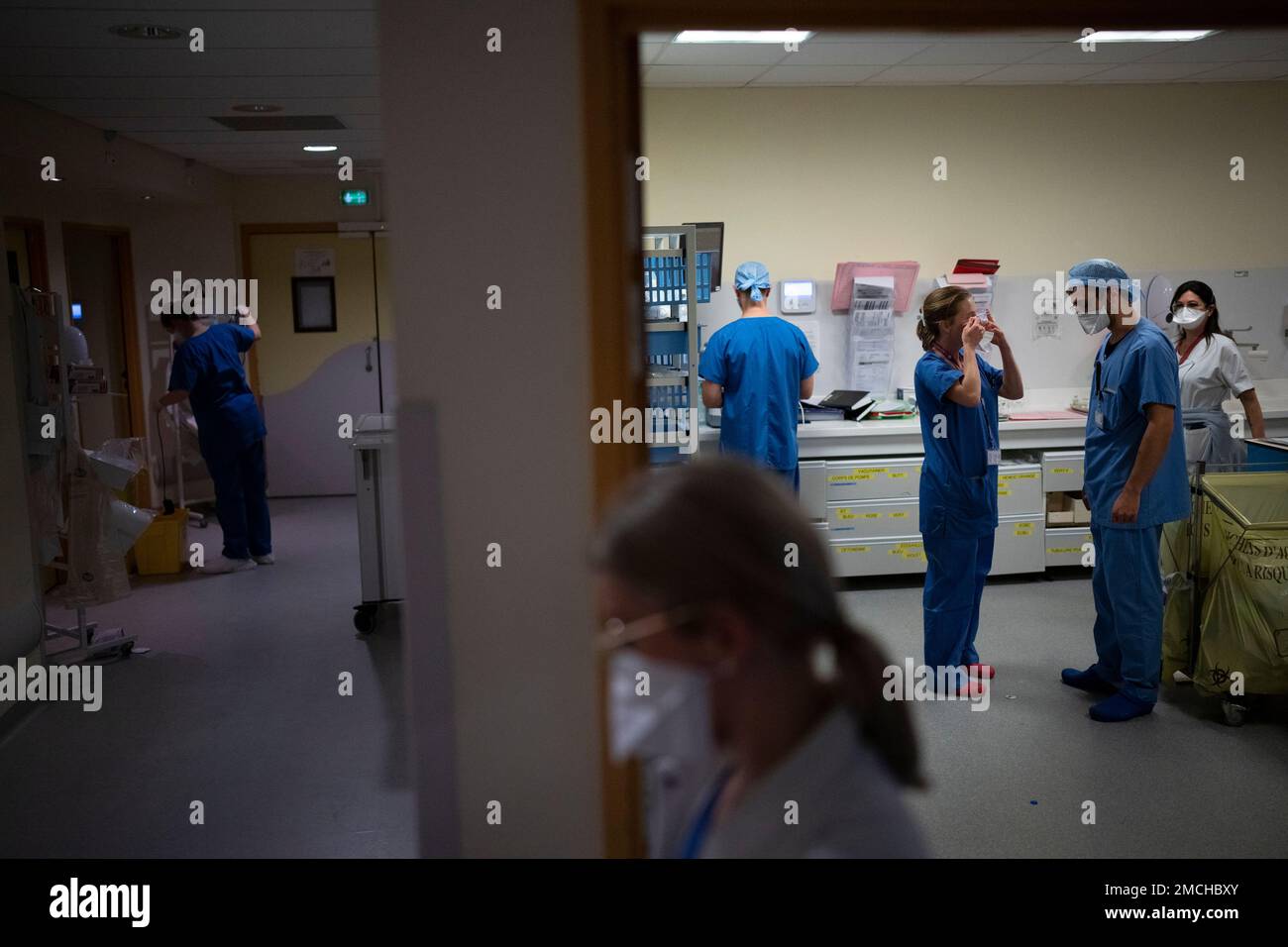Medical workers are pictured in the COVID-19 intensive care unit at the ...