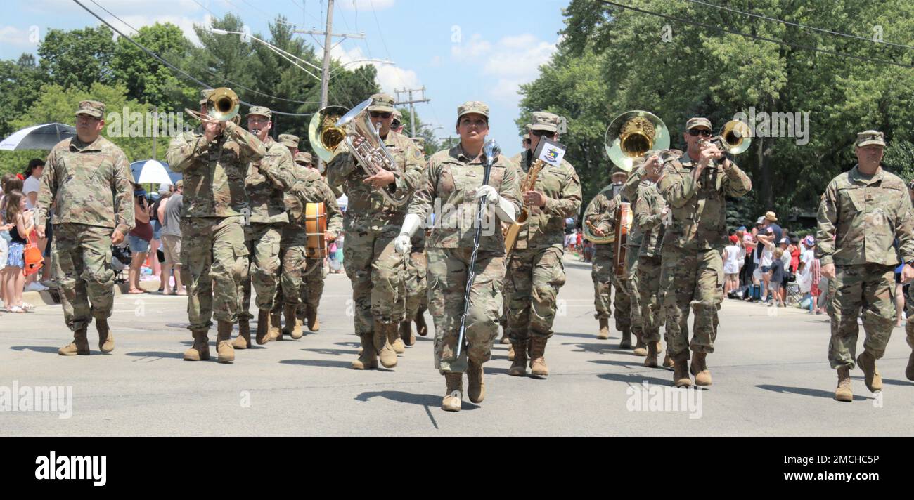 Sgt. Leslie Castro, the drum major, leads her unit in Crystal Lake ...