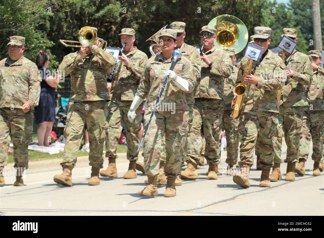Sgt. Leslie Castro, the drum major, leads her unit in Crystal Lake ...