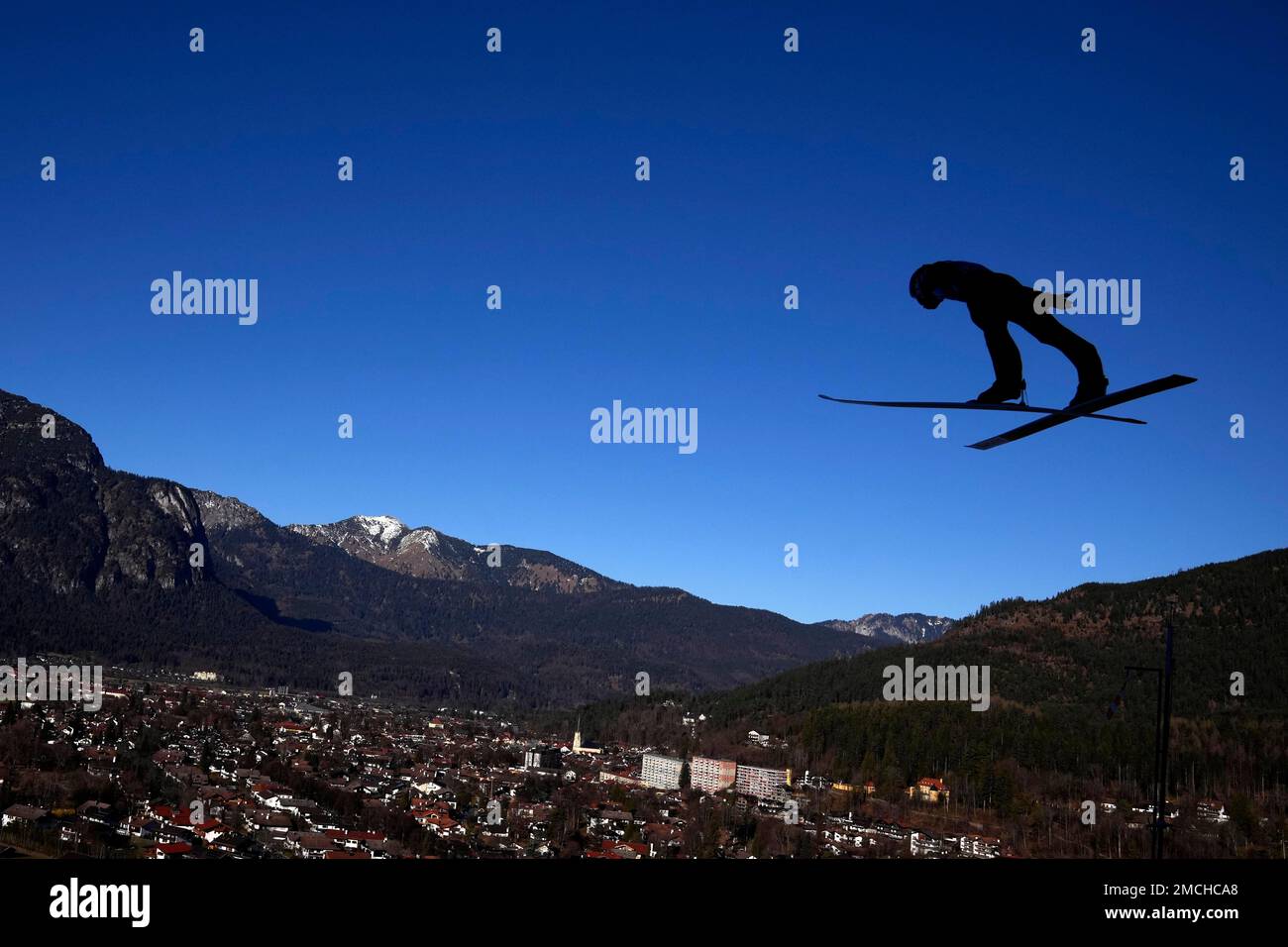 Manuel Fettner of Austria soars through the air during his trail jump ...