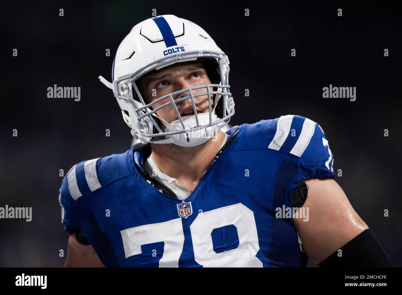 FILE - Indianapolis Colts center Ryan Kelly watches a replay during the ...