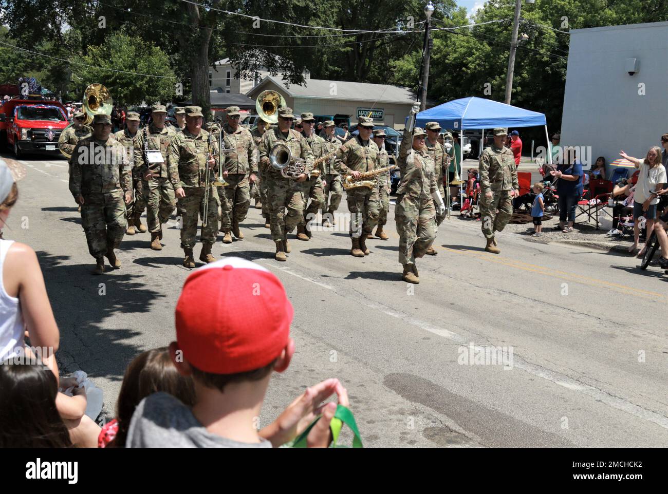 Sgt. Leslie Castro, the drum major, leads her unit in Crystal Lake ...