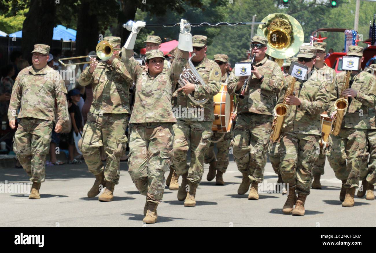 Sgt. Leslie Castro, the drum major, leads her unit in Crystal Lake ...