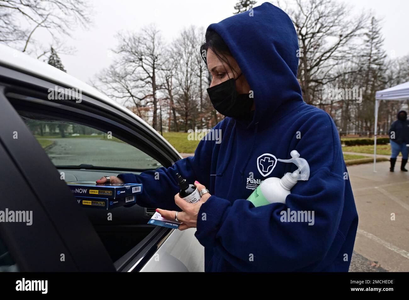 Youngstown City Heath Department worker Kathy Johnson hands out at-home ...