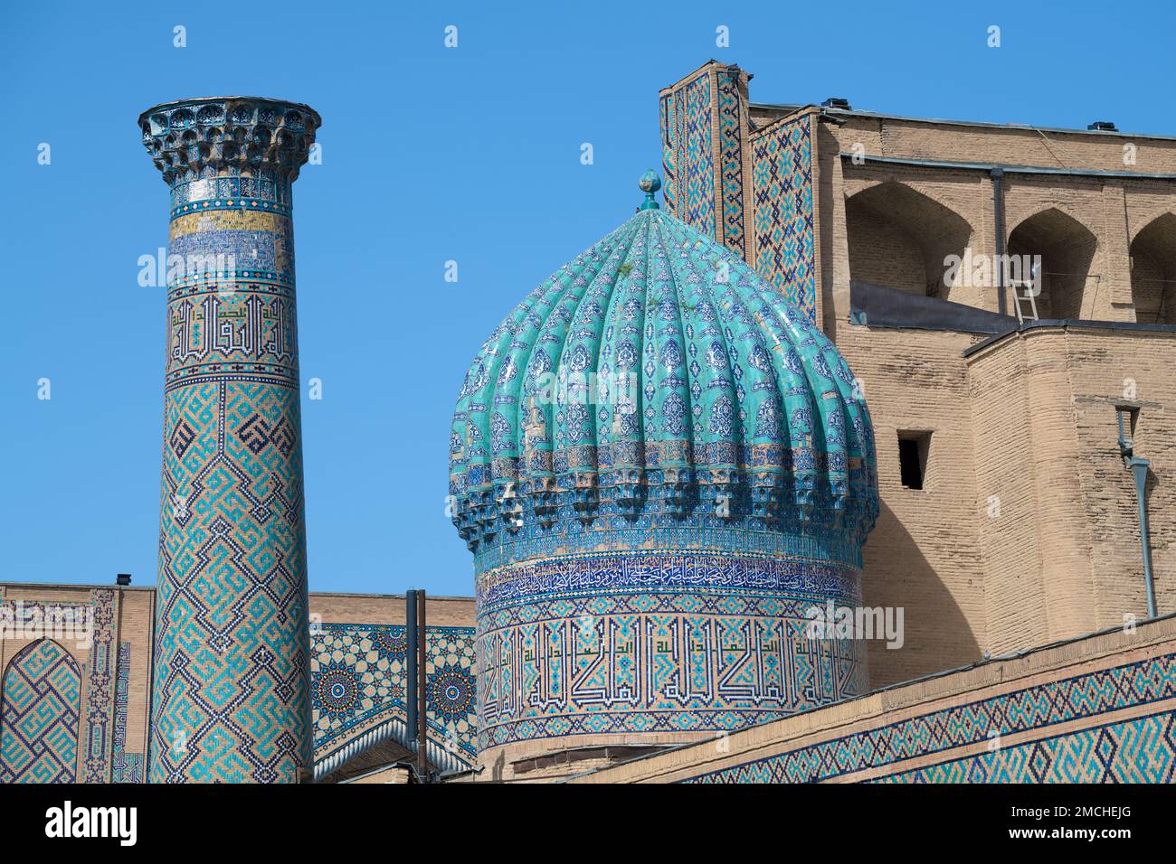 SAMARKAND, UZBEKISTAN - SEPTEMBER 12, 2022: The dome and minaret of the ... SAMARKAND, UZBEKISTAN - SEPTEMBER 12, 2022: The dome and minaret of the ...