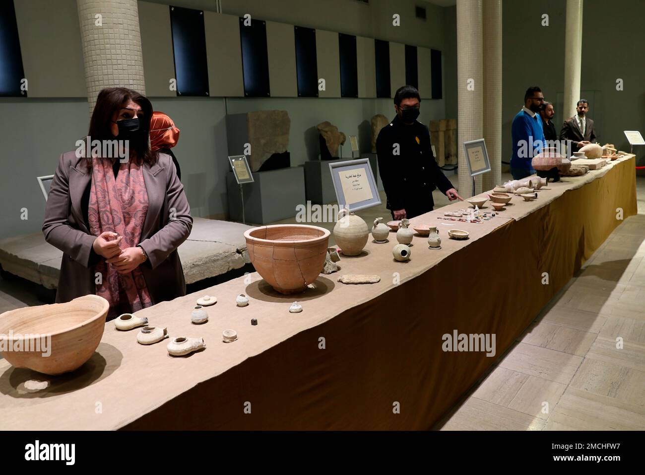 Recovered artifacts are displayed at the Iraqi National Museum in ...