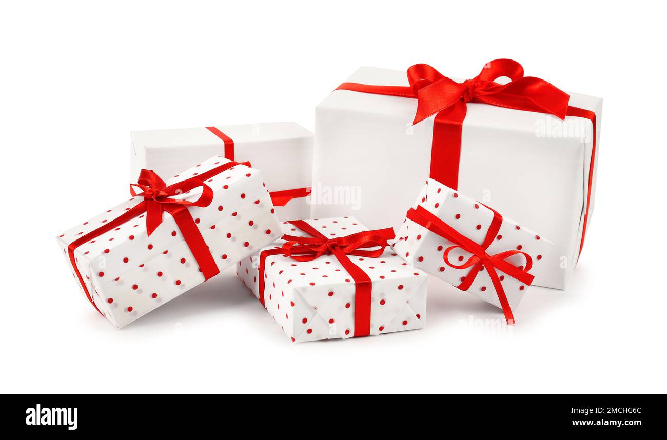 Gift boxes with red satin ribbon isolated on white background ...