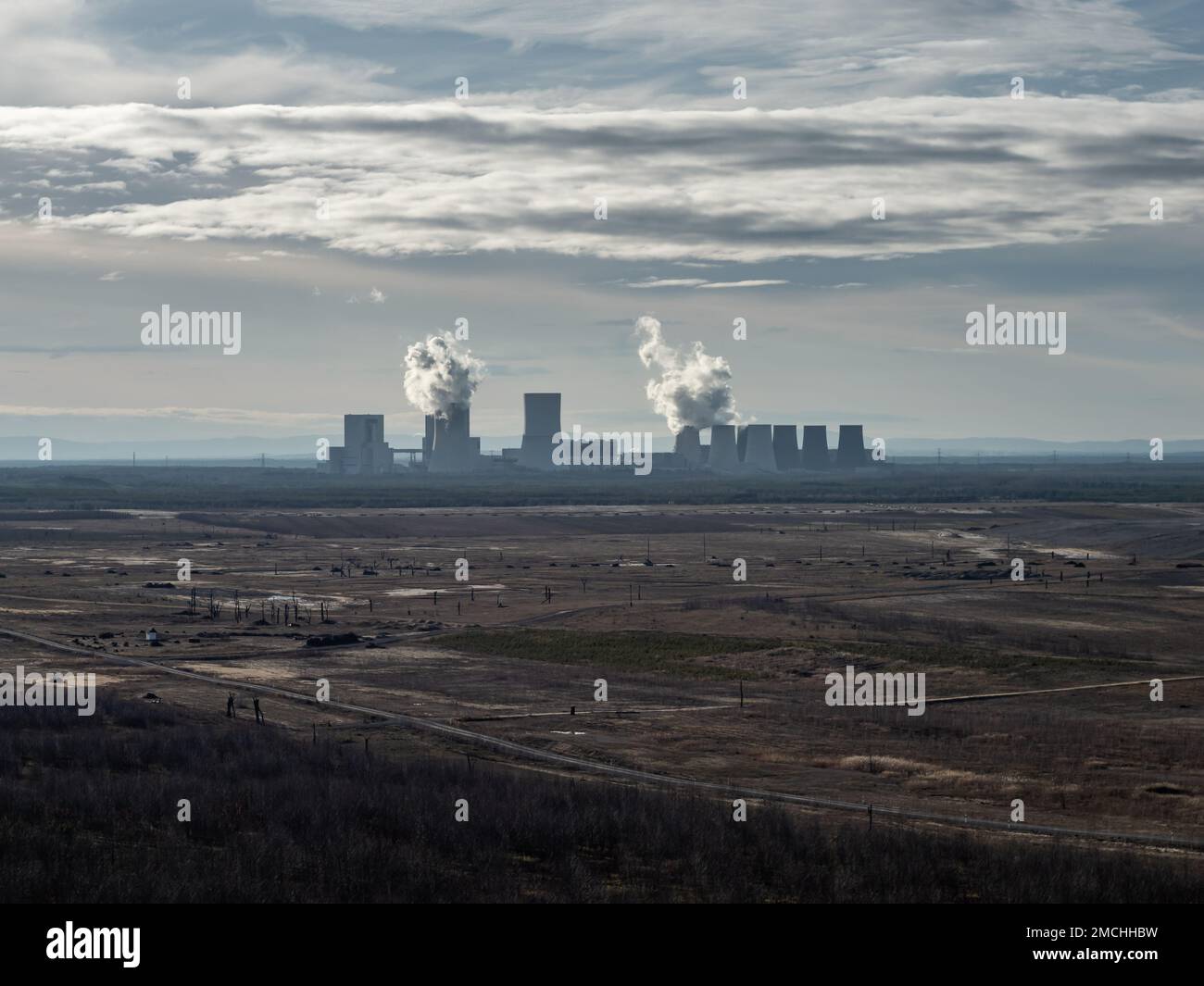 Landscape in a brown coal mining area with a lignite power plant. The ...