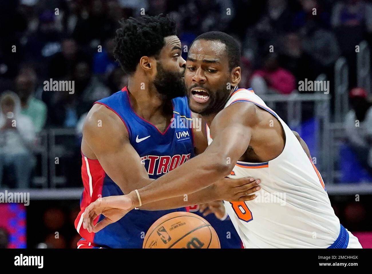 Detroit Pistons guard Derrick Walton Jr. fouls New York Knicks guard ...