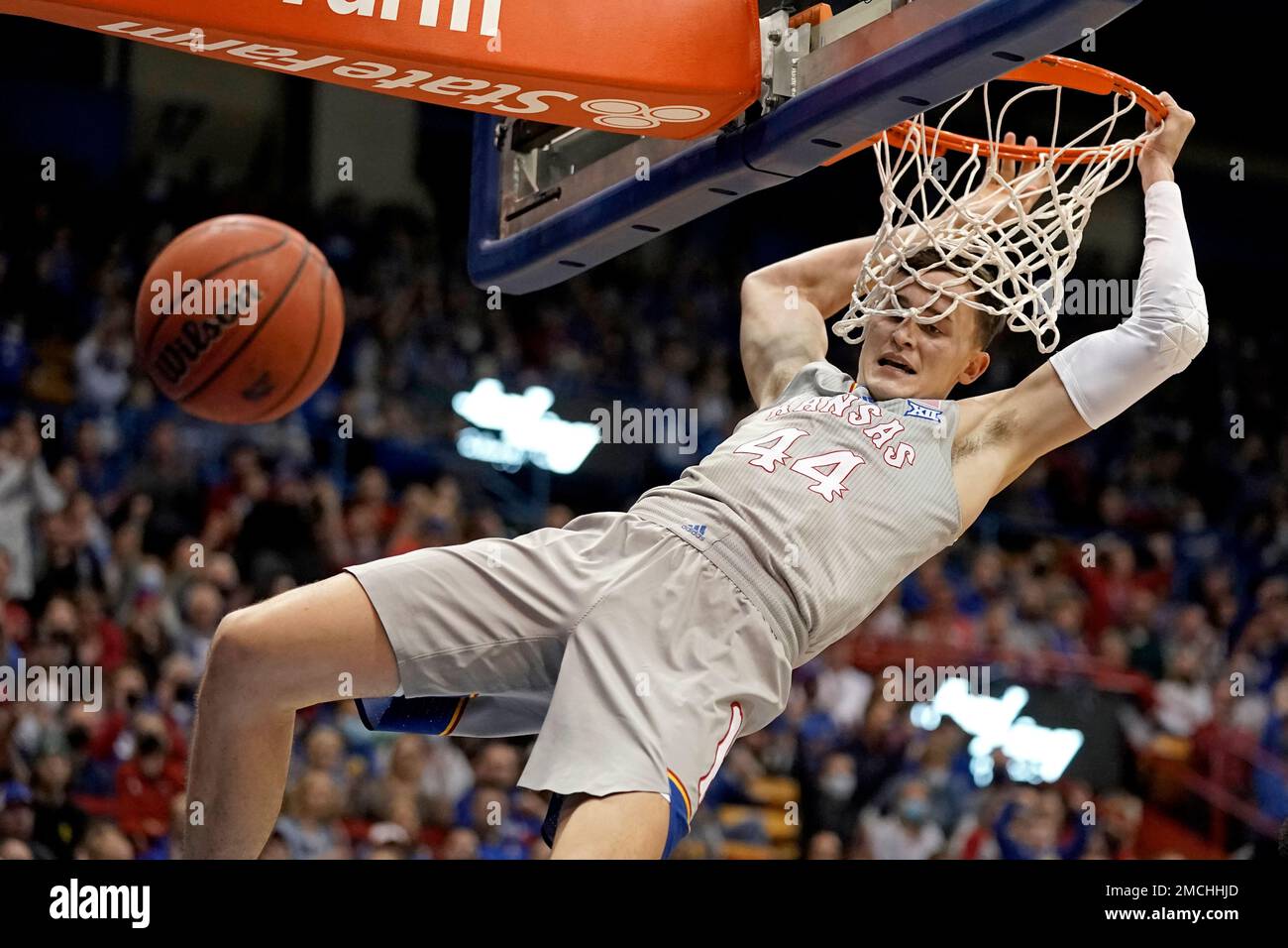 Kansas' Mitch Lightfoot dunks the ball during the first half of an NCAA ...