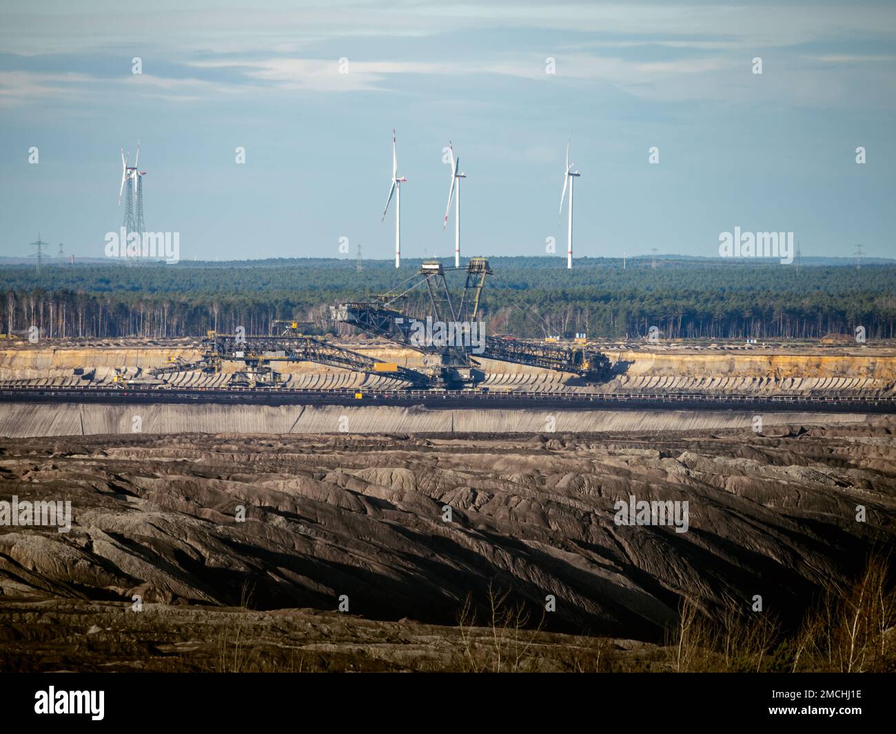 Coal excavator in an open pit mine in Nochten. Digging deep into the ...