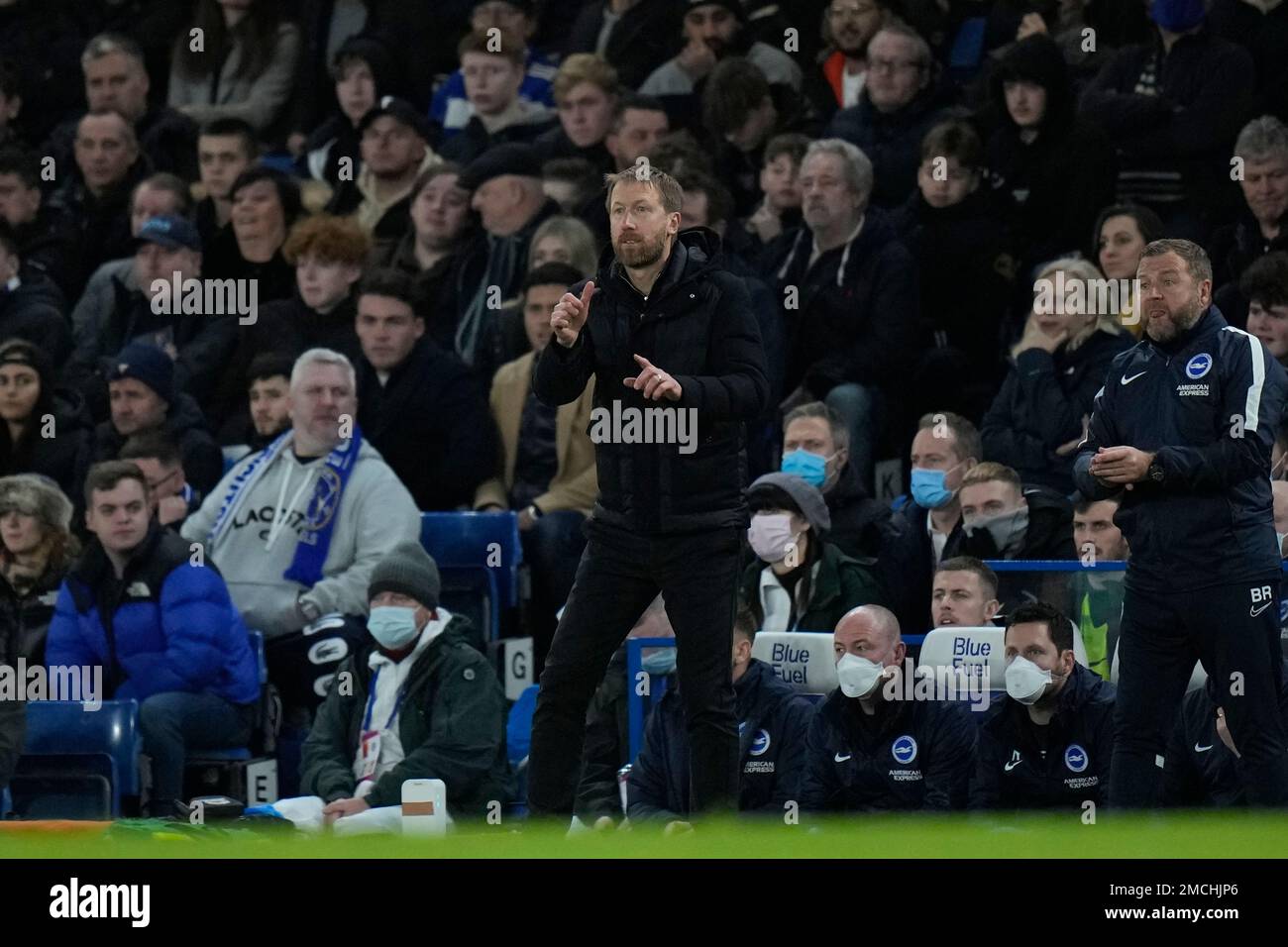 Brighton's head coach Graham Potter gives instructions from the side ...
