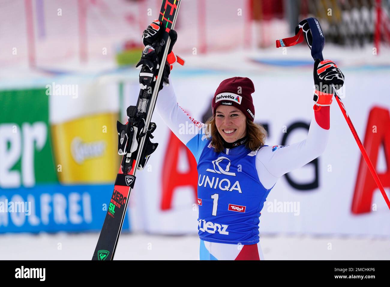 Switzerland's Michelle Gisin celebrates her third place on the podium ...