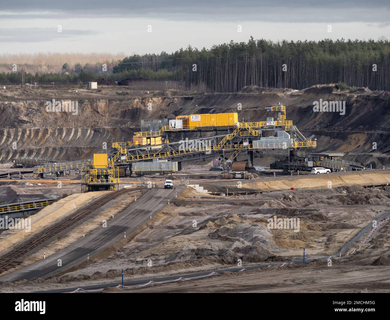 Machinery for brown coal mining in an open pit. Huge steel monsters for ...