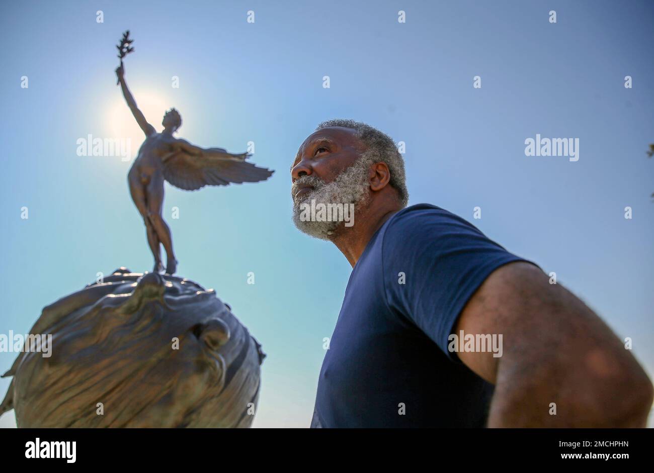 Reuben Green, a retired Black Naval officer, poses in front of the ...