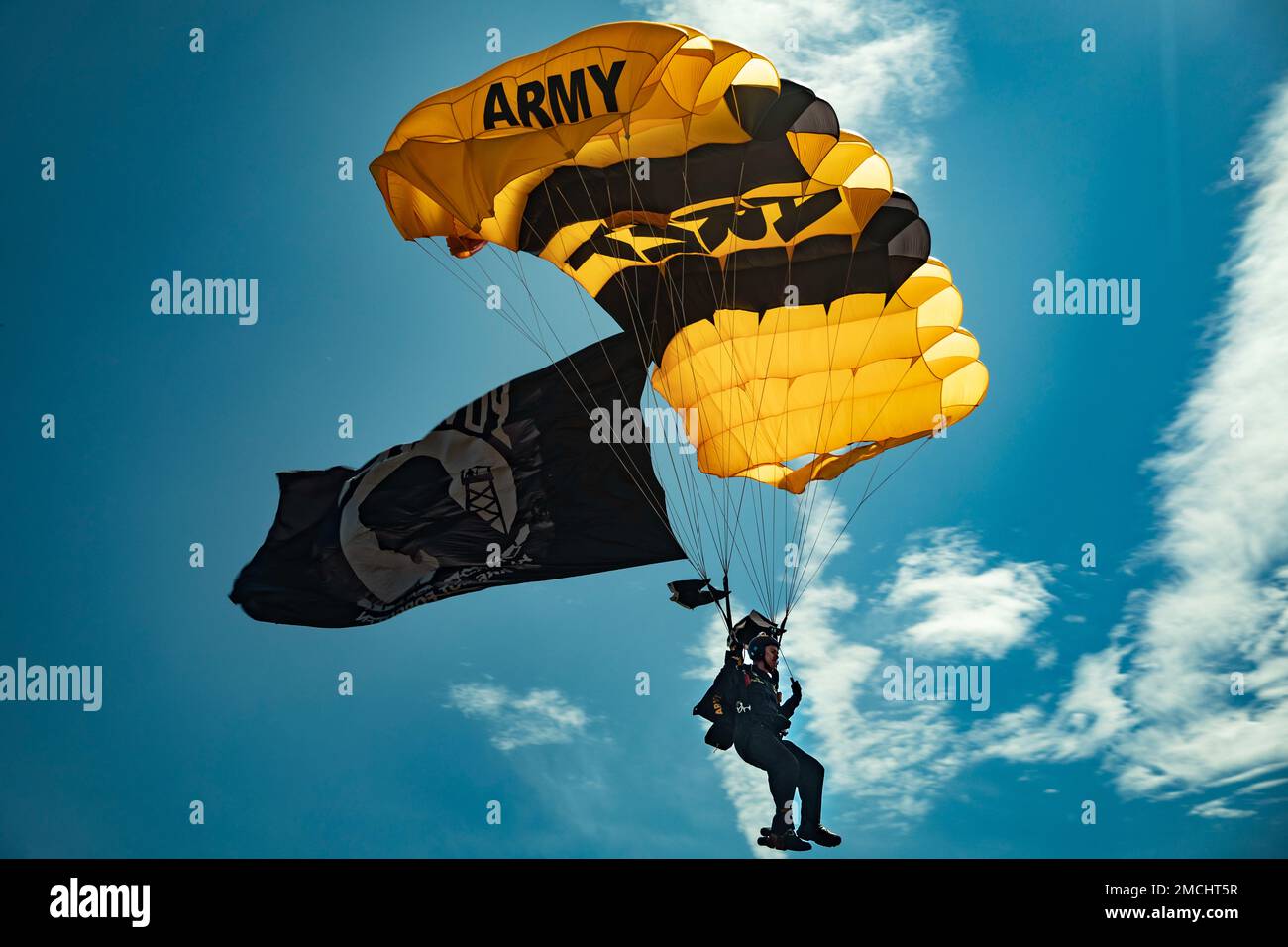 U.S. Army Staff Sergeant Griffin Mueller sails through the air bearing ...