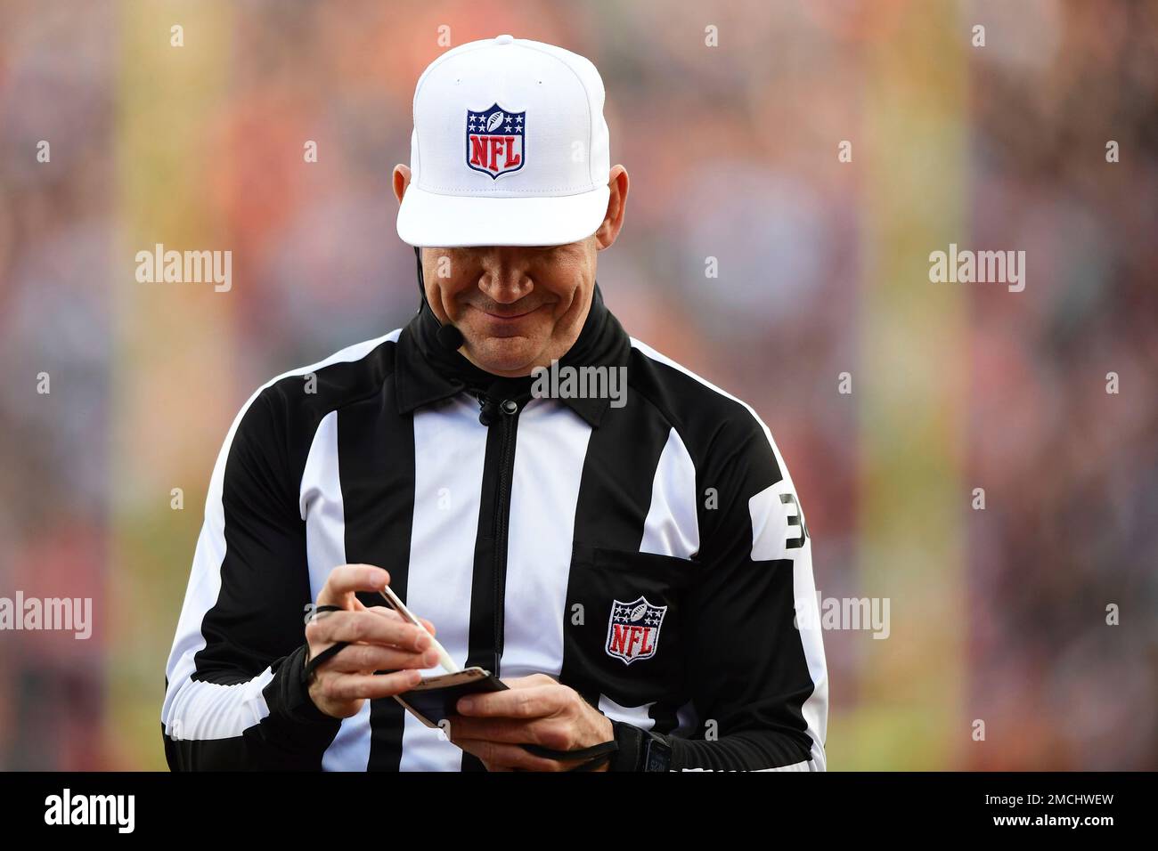 Referee Clete Blakeman (34) smiles during an NFL football game between ...