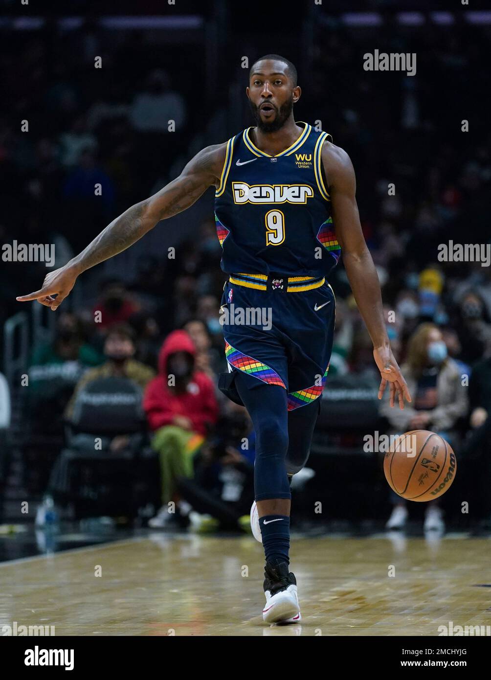 Denver Nuggets guard Davon Reed (9) controls the ball during an NBA ...