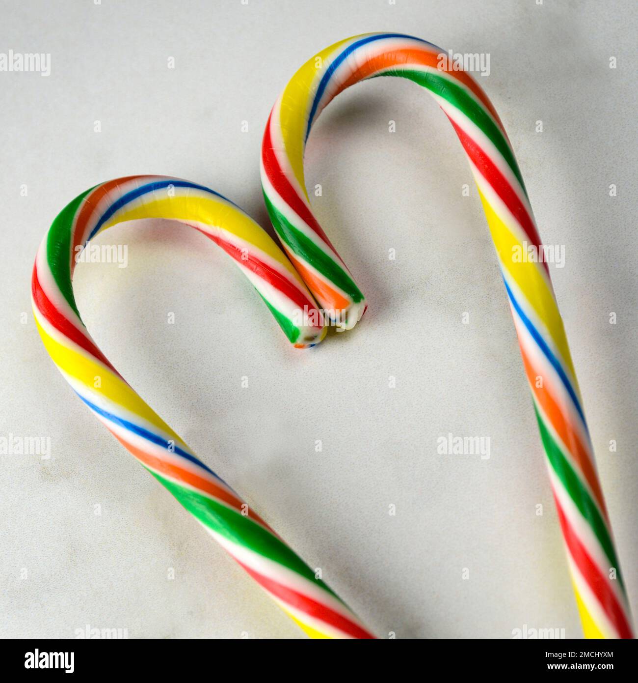 Candy canes in a heart shape Stock Photo - Alamy