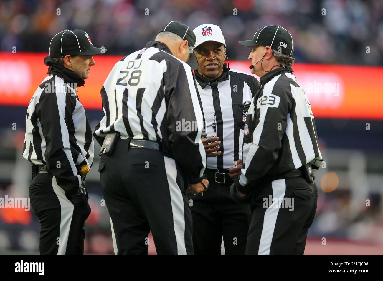 Side judge Dave Hawkshaw (107) down judge Mark Hittner (28) referee ...