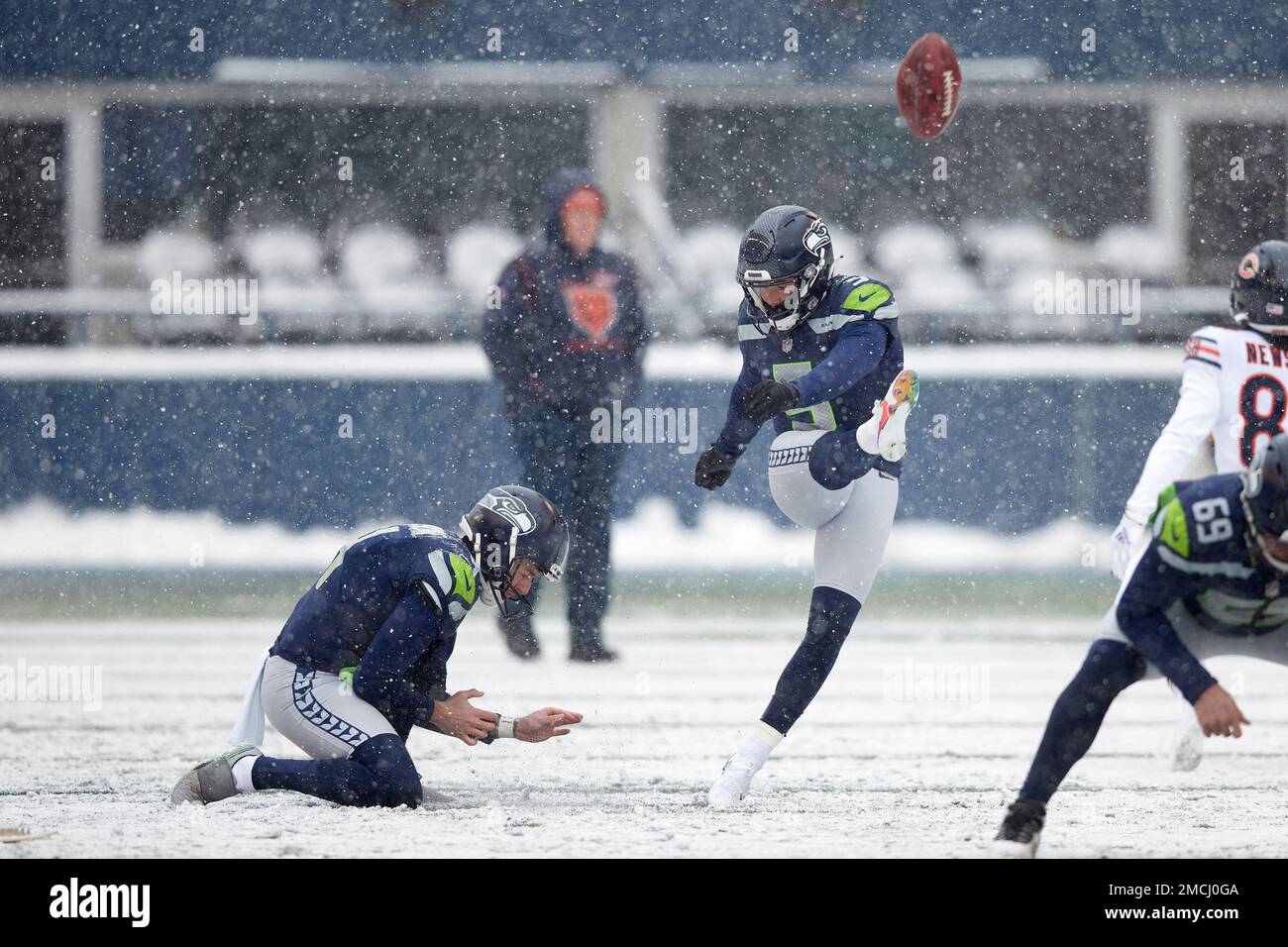 Seattle Seahawks kicker Jason Myers makes a kick with Michael Dickson ...