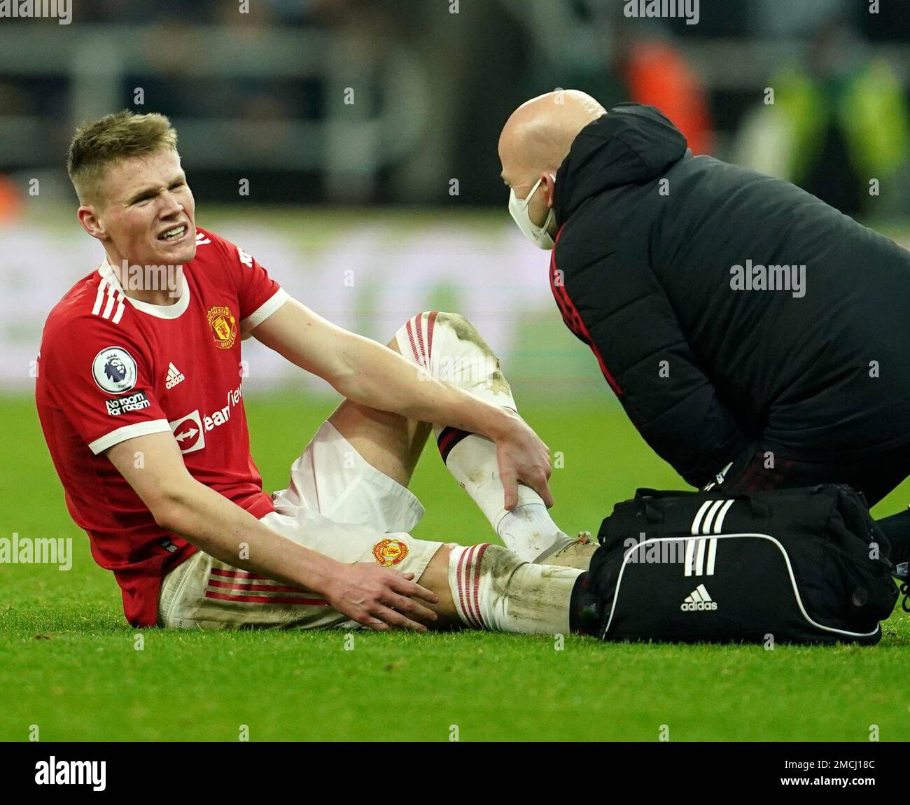 Manchester United's Scott McTominay receives medical treatment during ...