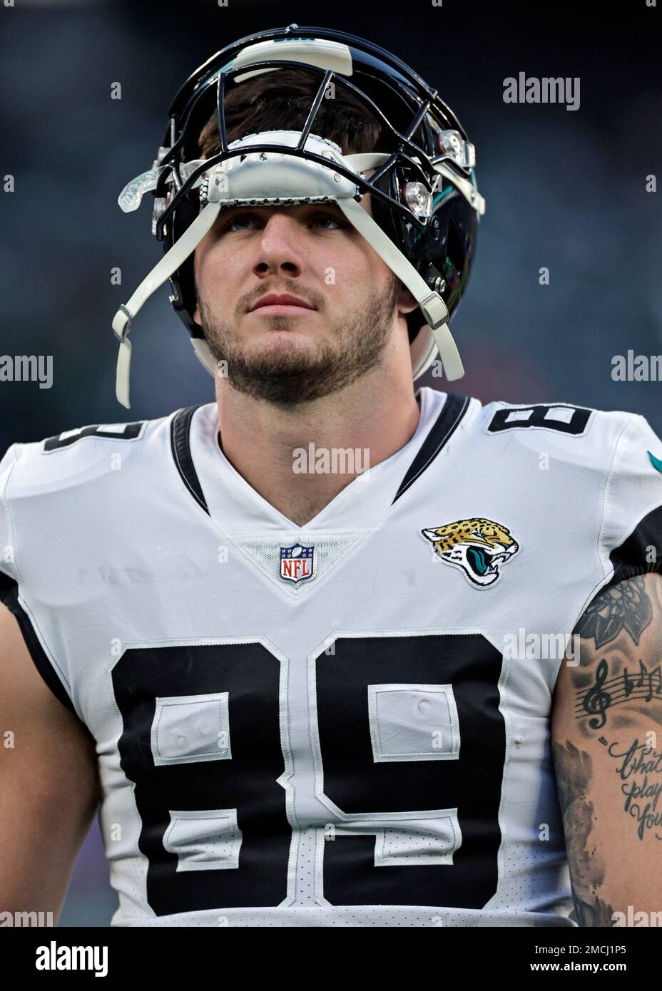 Jacksonville Jaguars tight end Luke Farrell (89) on the bench looks on ...