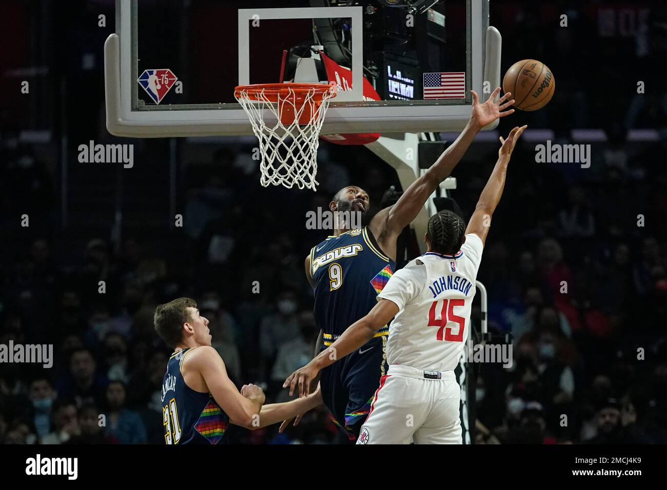 Denver Nuggets guard Davon Reed (9) defends against Los Angeles ...