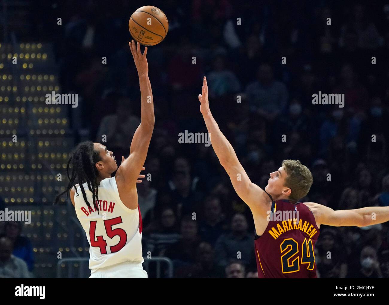 Toronto Raptors' Dalano Banton (45) shoots over Cleveland Cavaliers ...