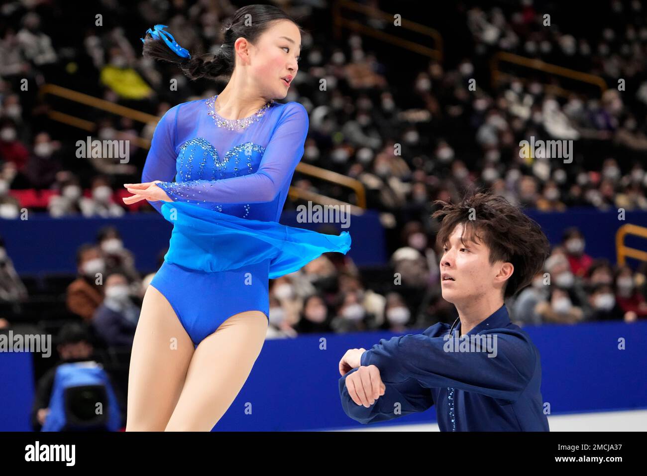 Miyu Yunoki, top, and Shoya Ichihashi, bottom, of Japan perform during ...