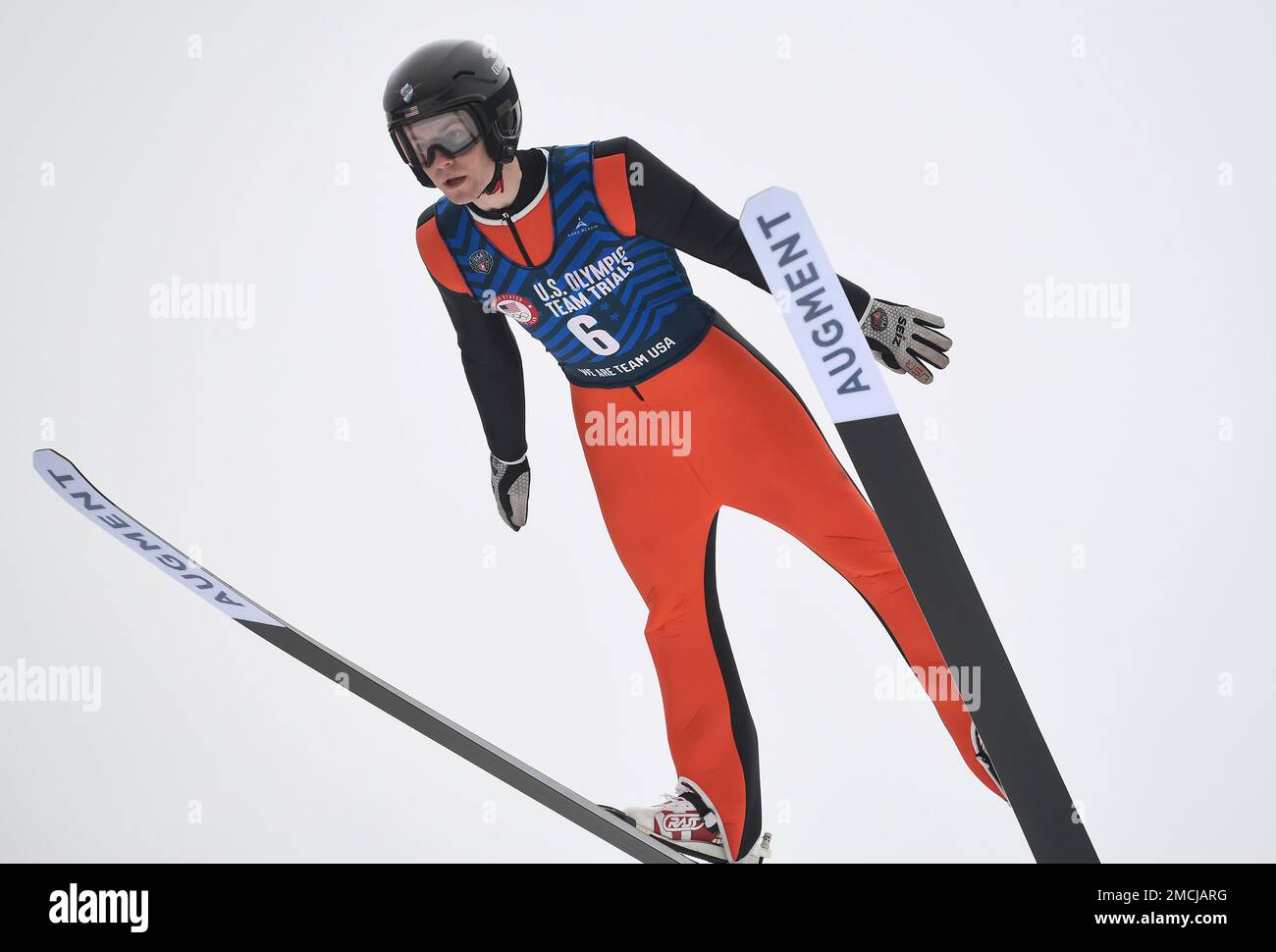 Casey Larson soars through the air during the men's ski jumping ...