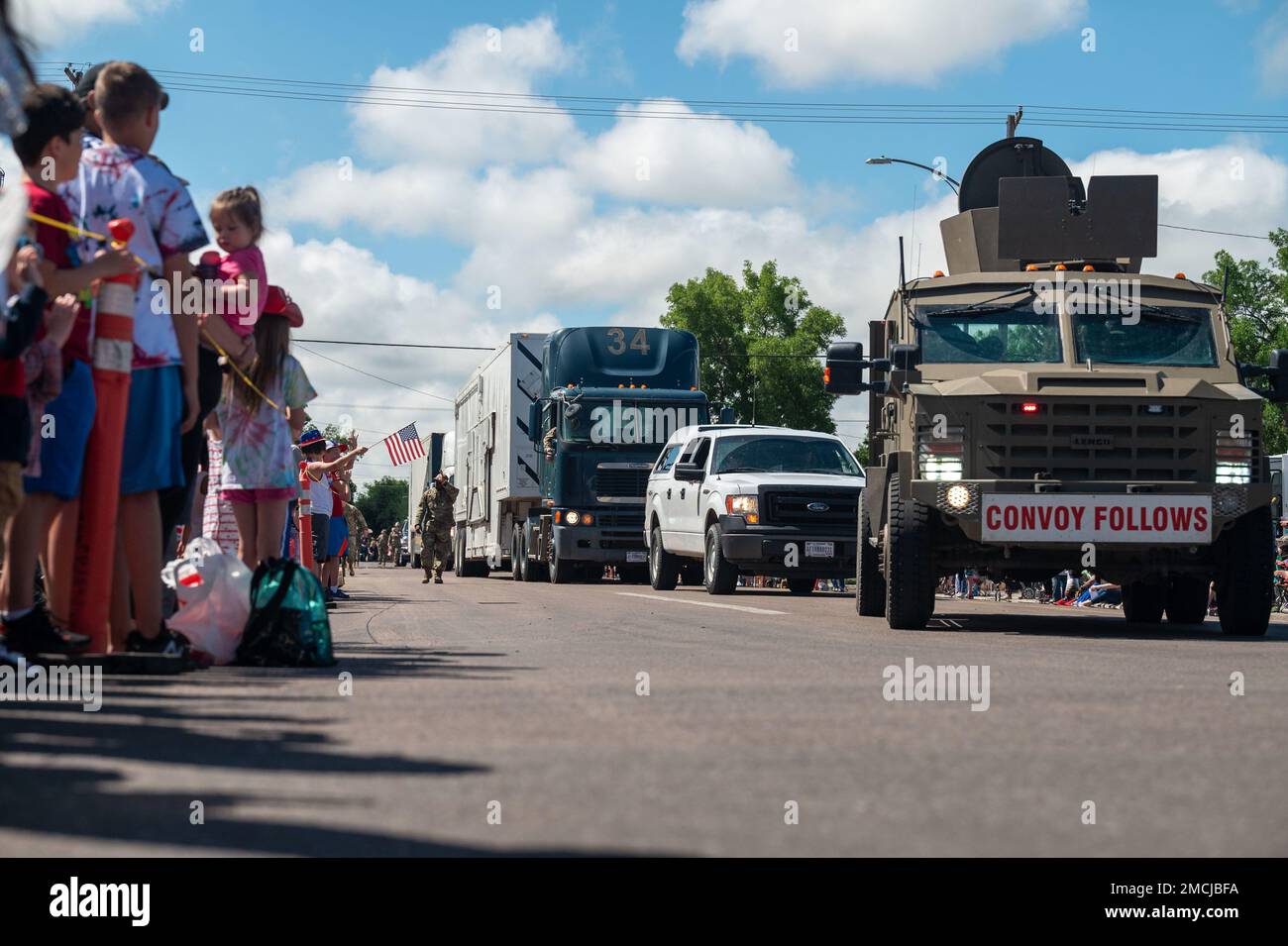 A mock maintenance convoy team participates in an Independence Day ...