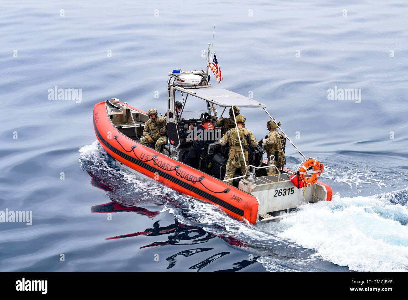 The Over the Horizon (OTH) cutter boat crew assigned to the Famous ...