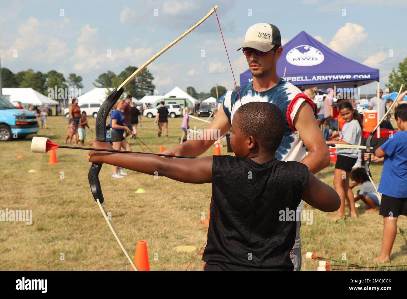 Julian Buckner, 9, practices his archery skills July 4 at the Division ...