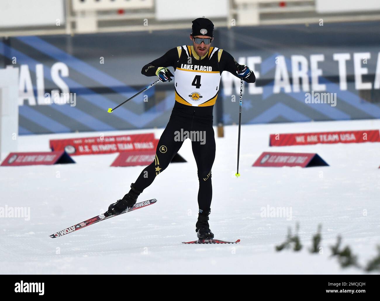 Taylor Fletcher skis to the finish area to win the cross country stage ...