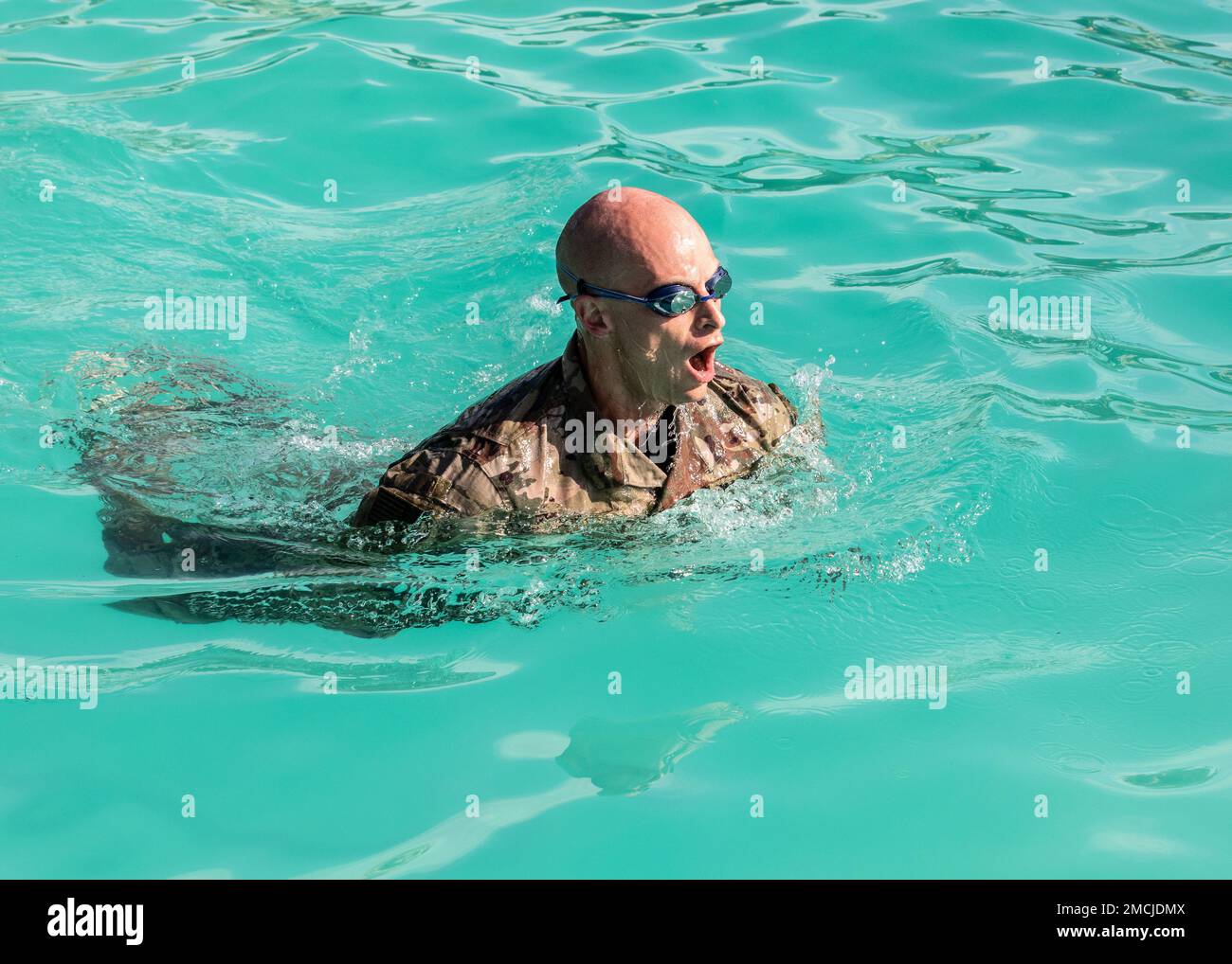 A Virginia Army National Guard Soldier participates in the 100-meter ...