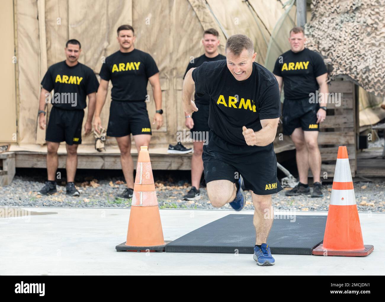 U.S. Army National Guard Maj. Peter Brookes runs shuttle sprints during ...
