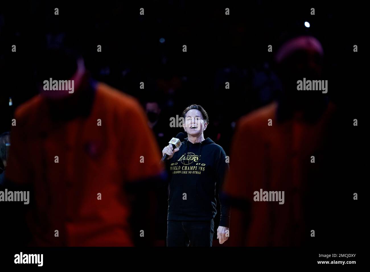 Davis Gaines sings the national anthem before an NBA basketball game ...